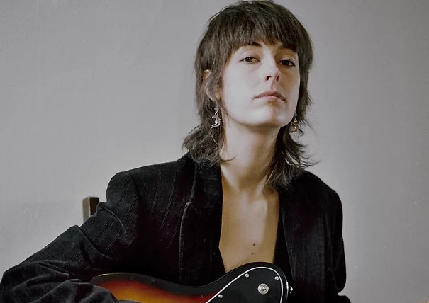 Melanie Baker Displays Fearless Vulnerability on Orchestrated "Waiting ...